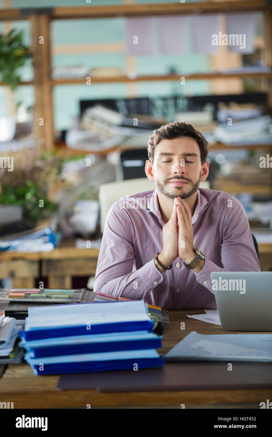 Male architect thinking in the office Stock Photo - Alamy