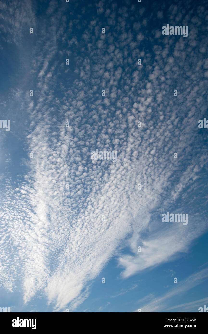 Small clouds in blue sky hi-res stock photography and images - Alamy