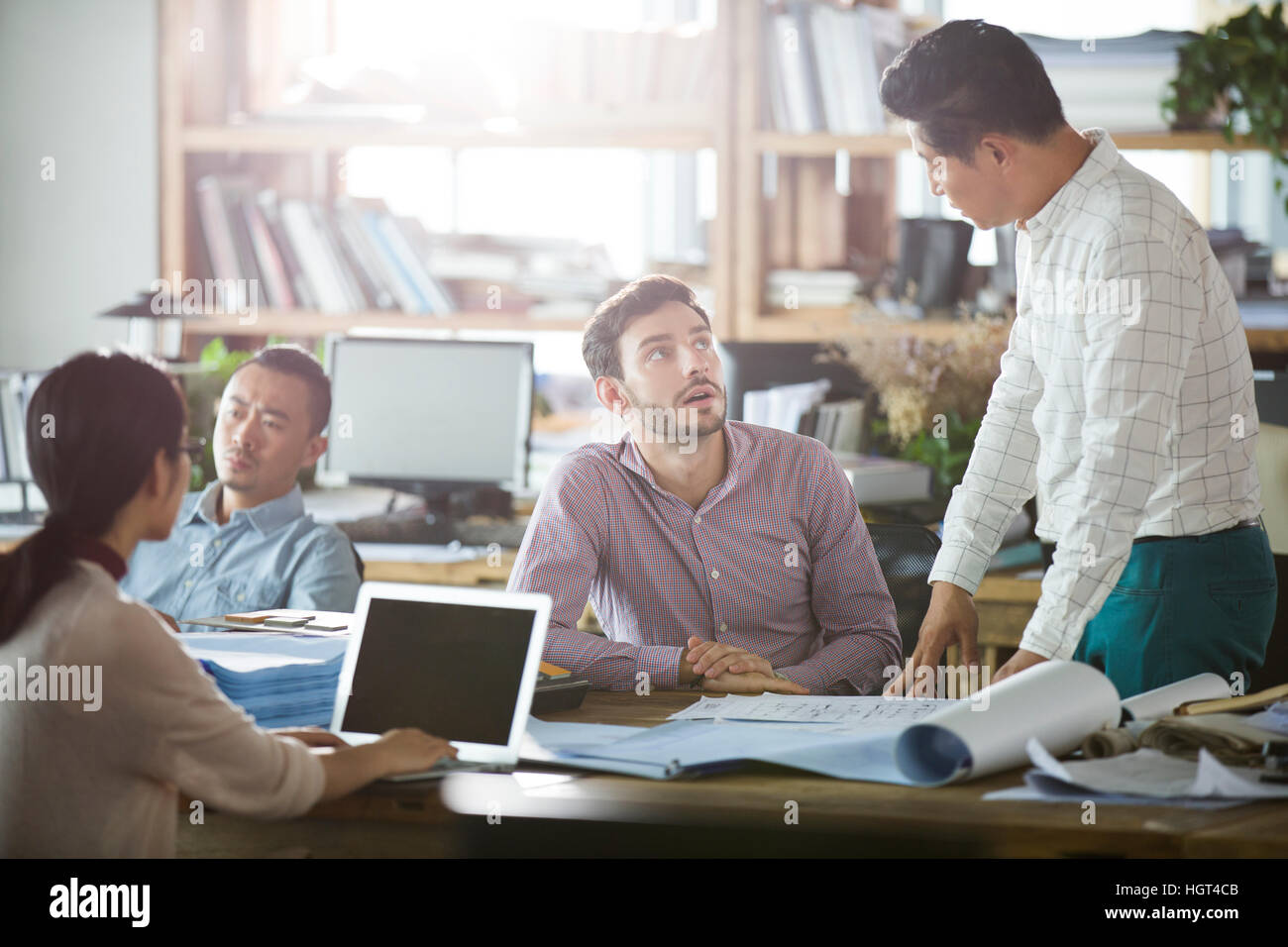 Architects talking in the office Stock Photo - Alamy