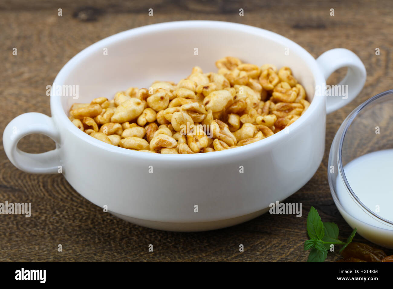Rise flakes with milk, raisin and mint leaves Stock Photo - Alamy