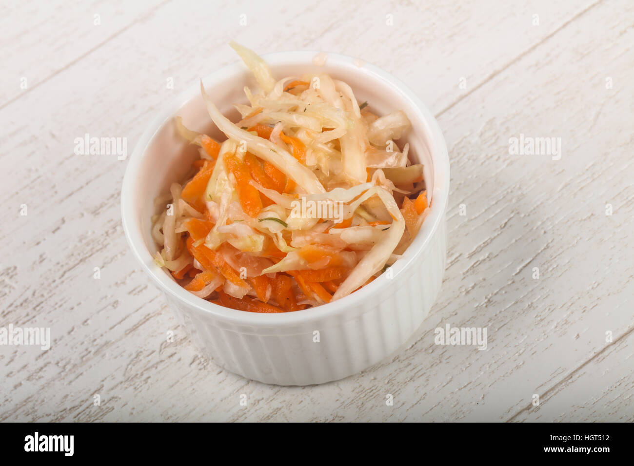 Raw pickled cabbage on wood background Stock Photo - Alamy