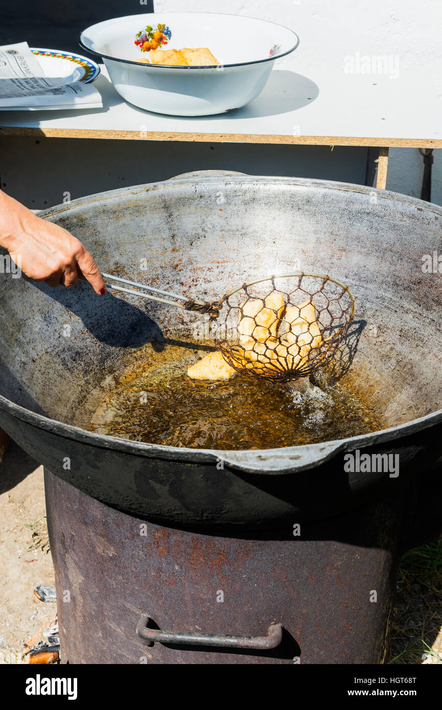 Kazakh Woman preparing the traditional local tandyr bread, Shymkent ...