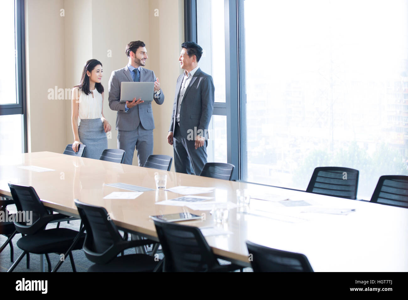 Business people talking in meeting room Stock Photo - Alamy