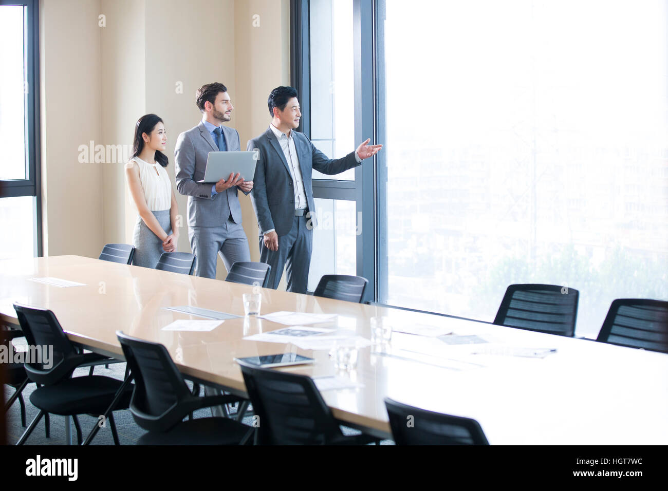 Business people talking in meeting room Stock Photo - Alamy