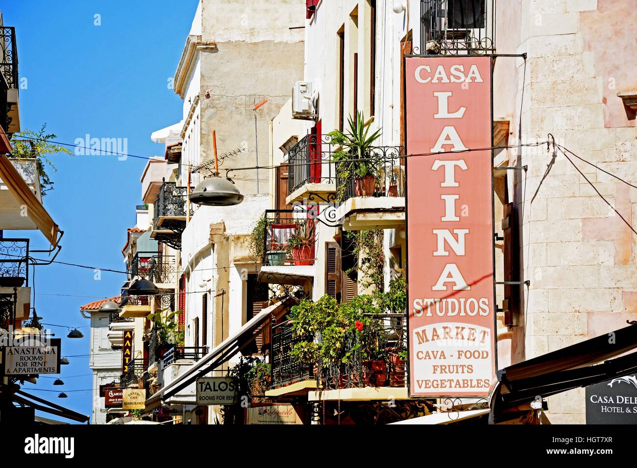 Buildings and shop signs along an old town street, Chania, Crete ...