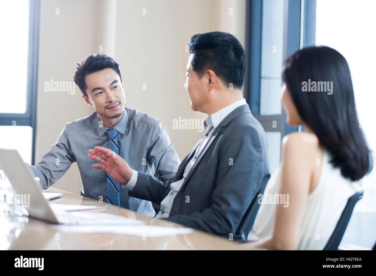 Business people talking in meeting room Stock Photo - Alamy