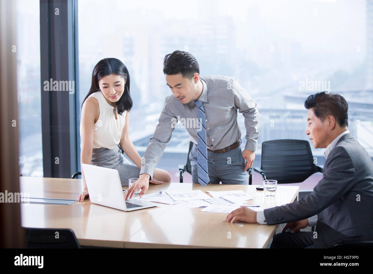 Business people talking in meeting room Stock Photo - Alamy