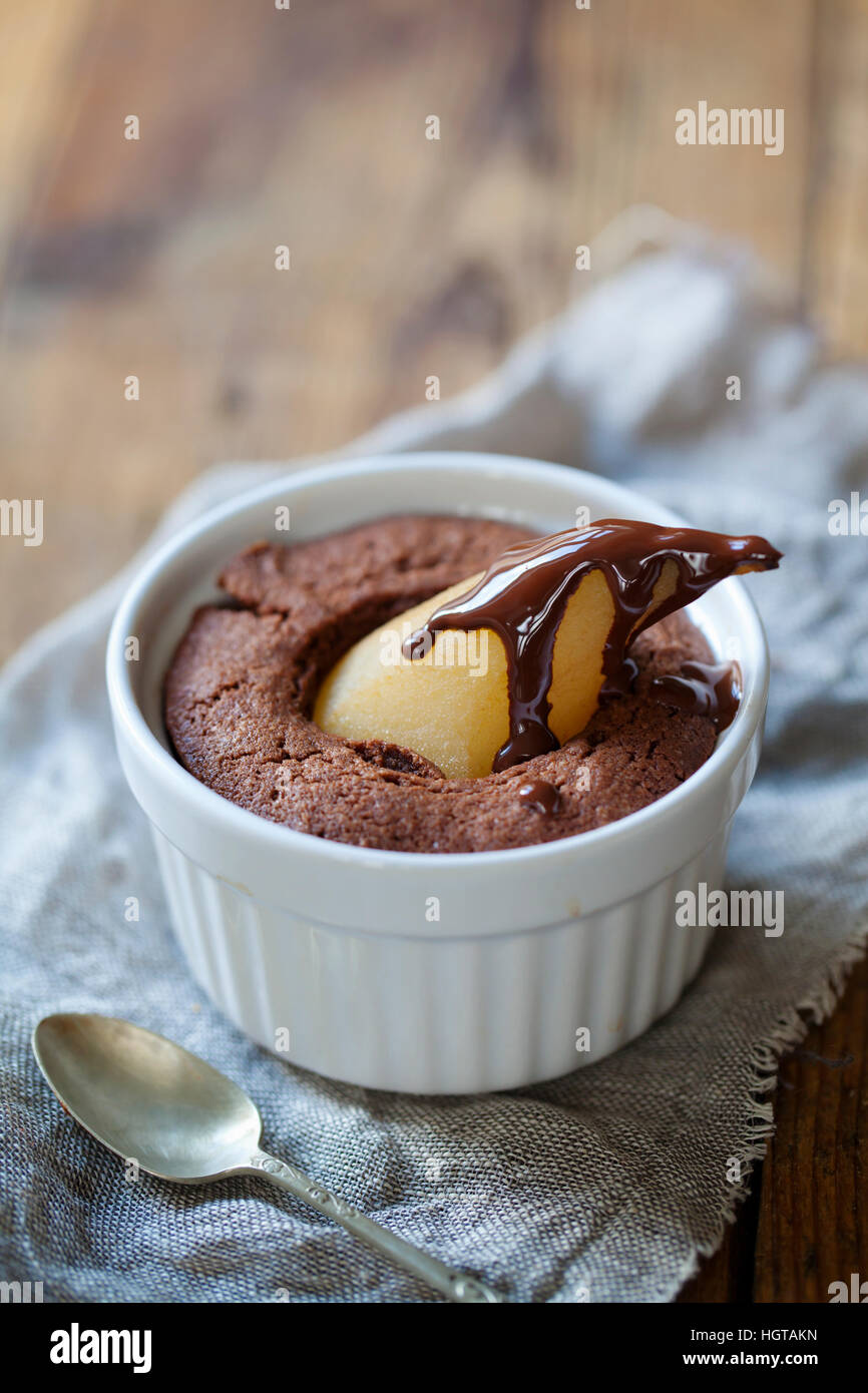 Chocolate sponge cake with poached pear Stock Photo - Alamy