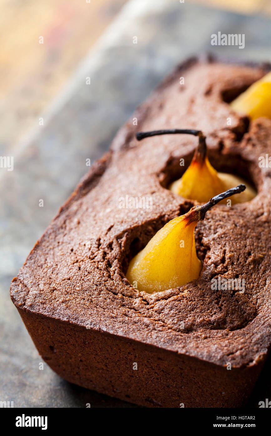 Chocolate sponge cake with poached pear Stock Photo - Alamy
