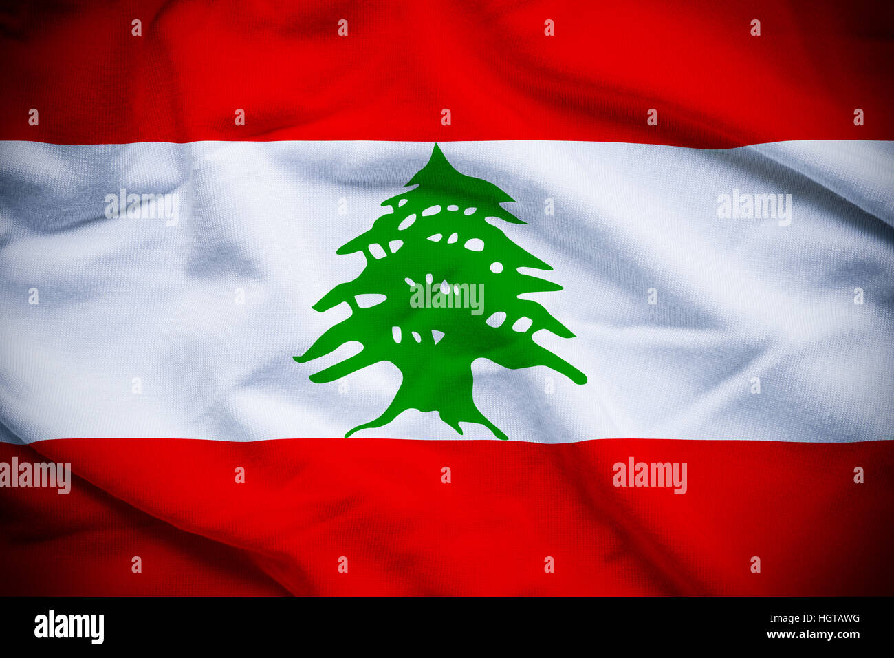 Wavy and rippled national flag of Lebanon background Stock Photo - Alamy