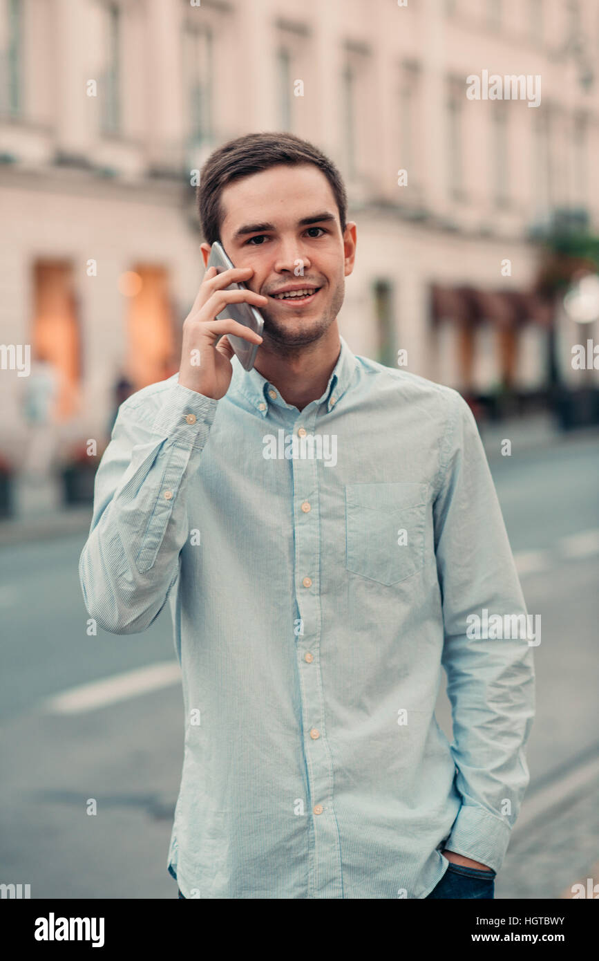 Handsome young man talking hi-res stock photography and images - Alamy