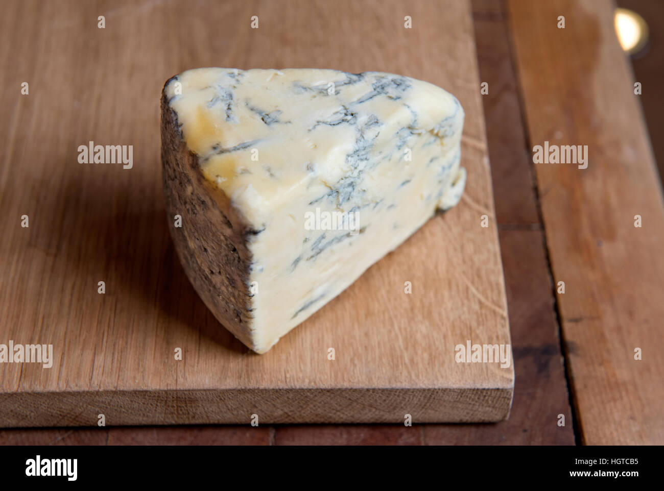 A wedge of Alex James’ English Blue Monday cheese Stock Photo - Alamy