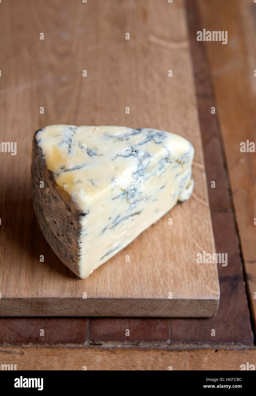 A wedge of Alex James’ English Blue Monday cheese Stock Photo - Alamy