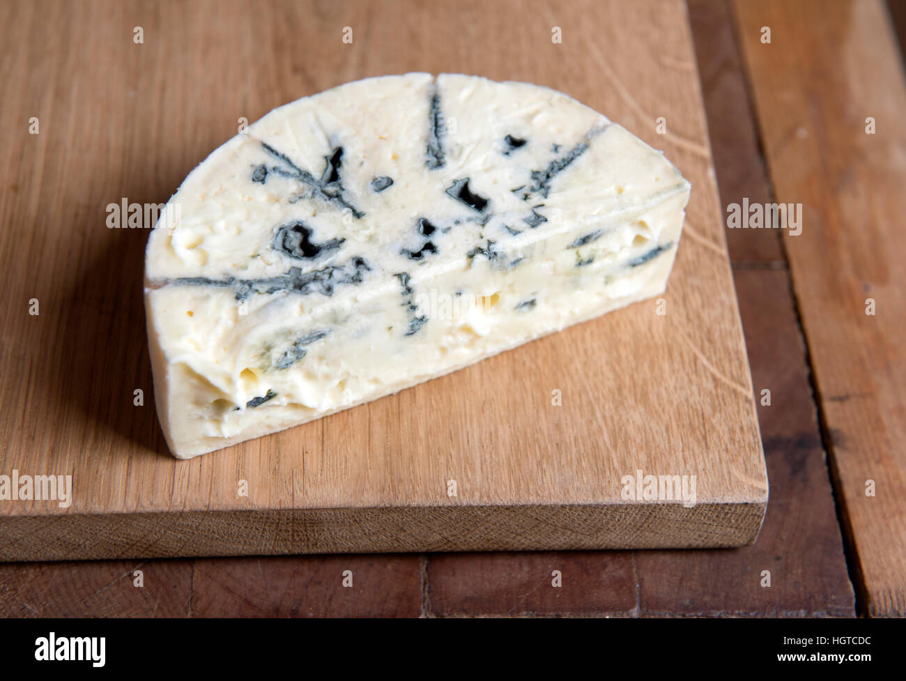 A wedge of soft Danish Blue cheese Stock Photo - Alamy