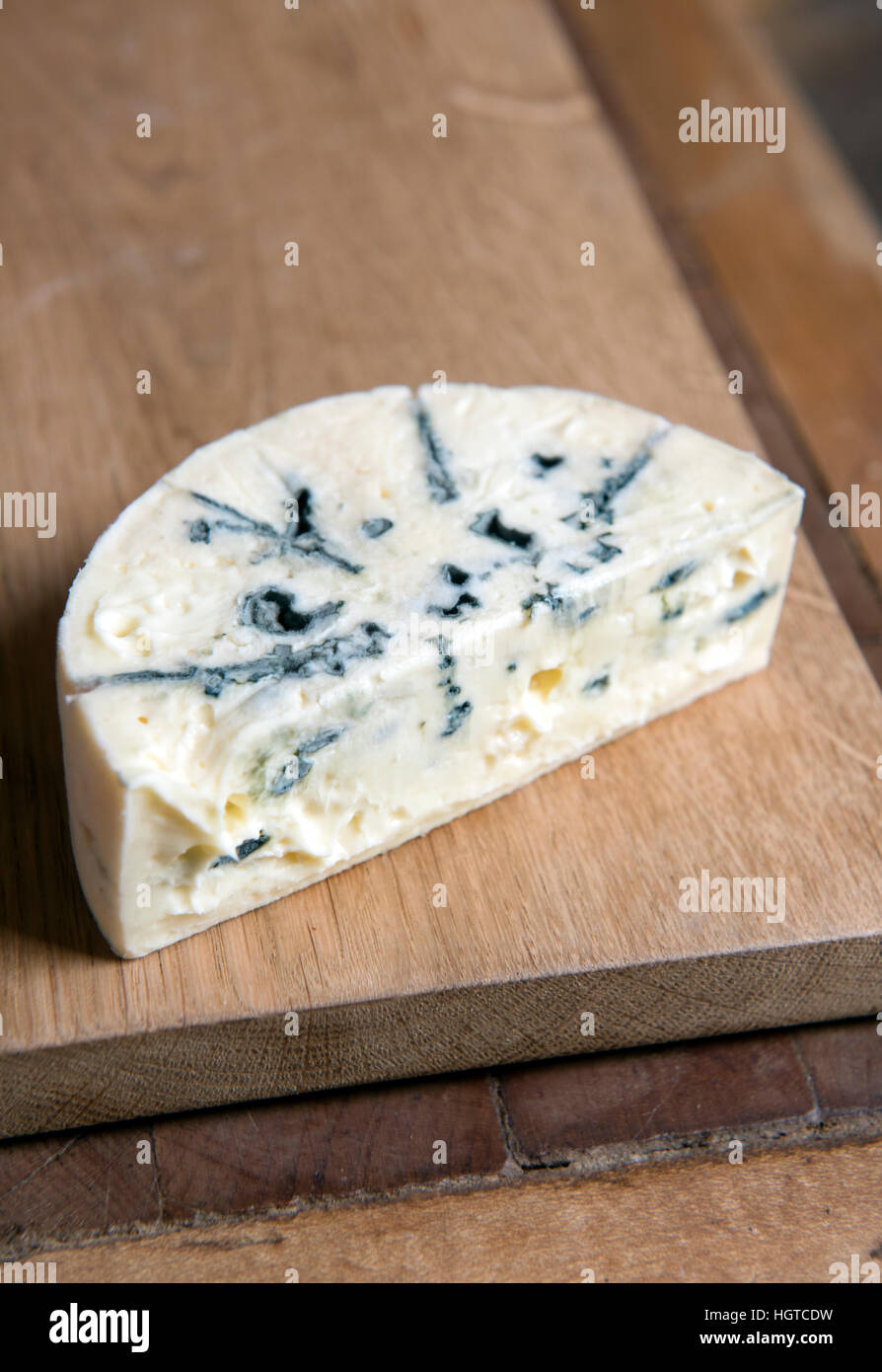 A wedge of soft Danish Blue cheese Stock Photo - Alamy