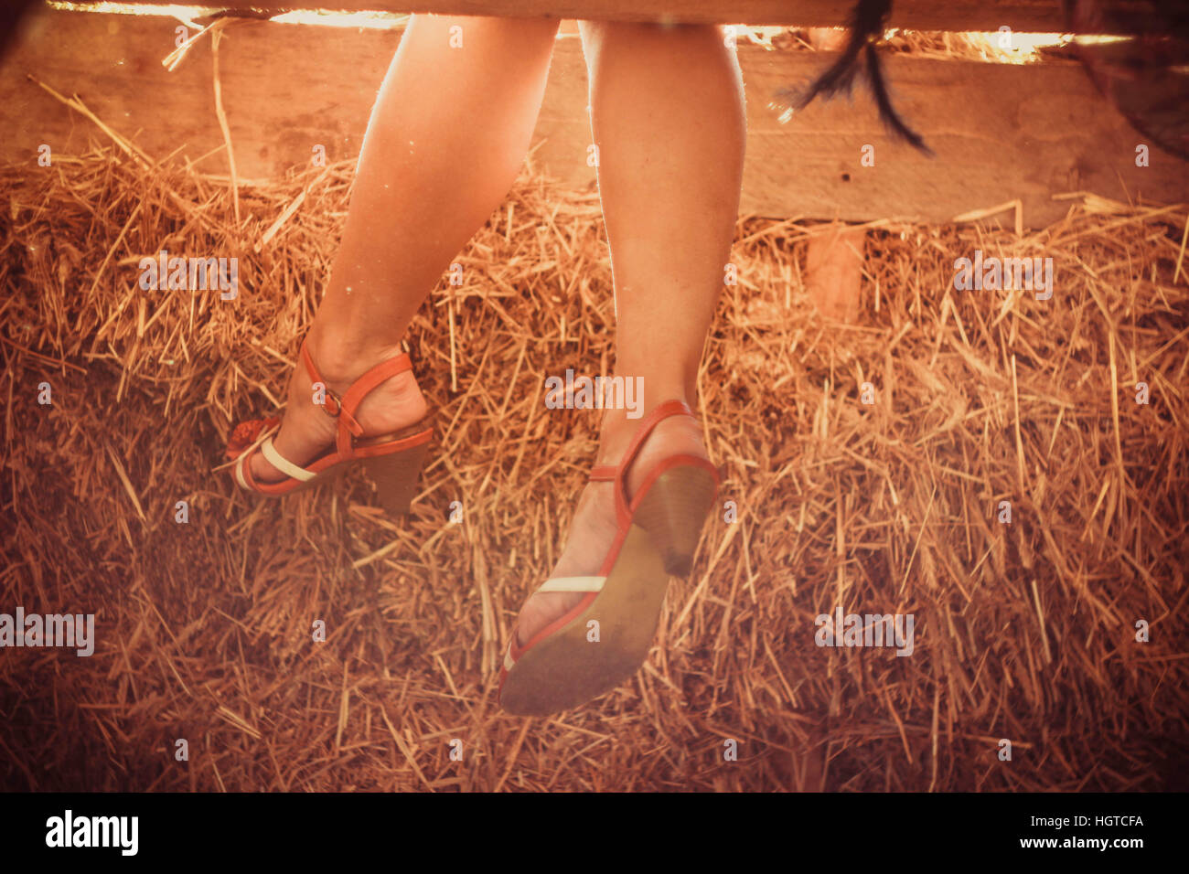 female feet hanging Stock Photo - Alamy