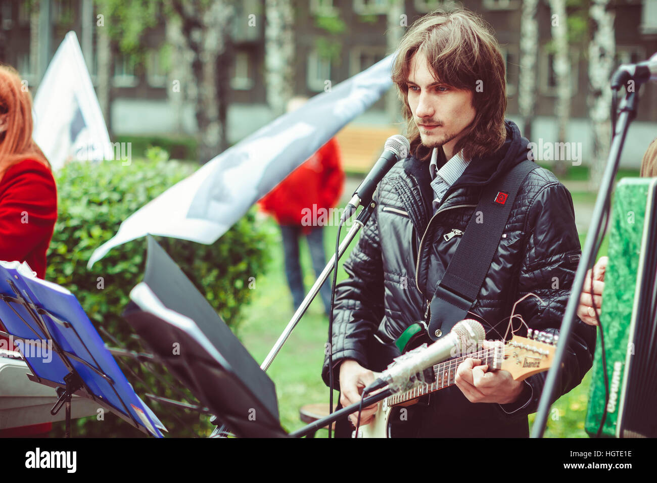 singer at the microphone in the street Stock Photo - Alamy