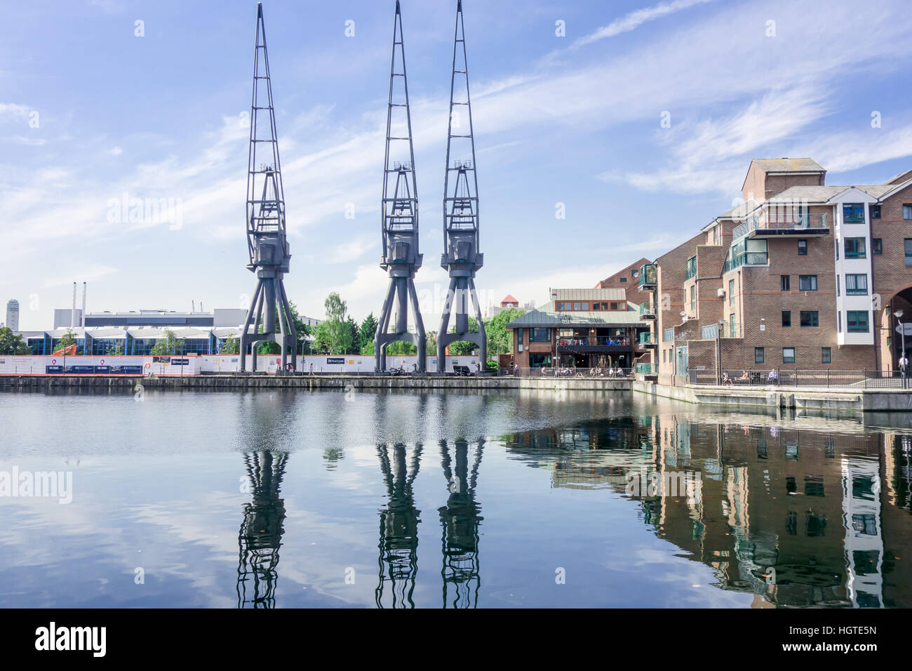 Dockland's cranes called derrick that used to load cargo from boats and ...