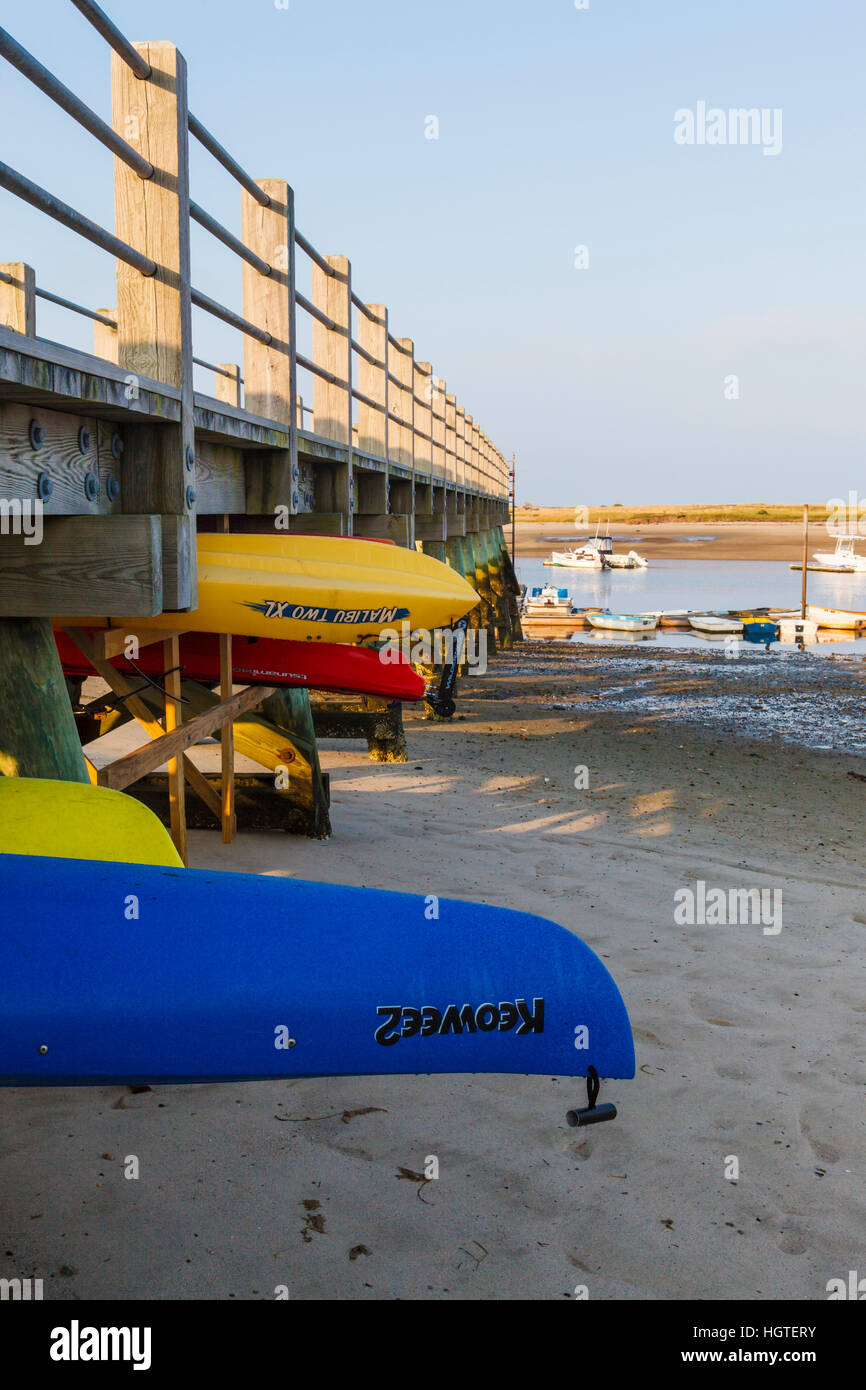 Kayaks under the pier in Pamet Harbor in Truro, Massachusetts. Cape Cod ...
