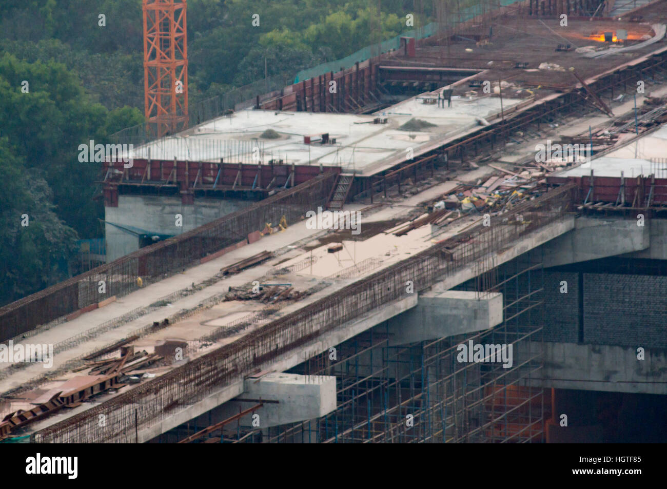 Under construction metro bridge in Noida. The Delhi metro is a critical ...
