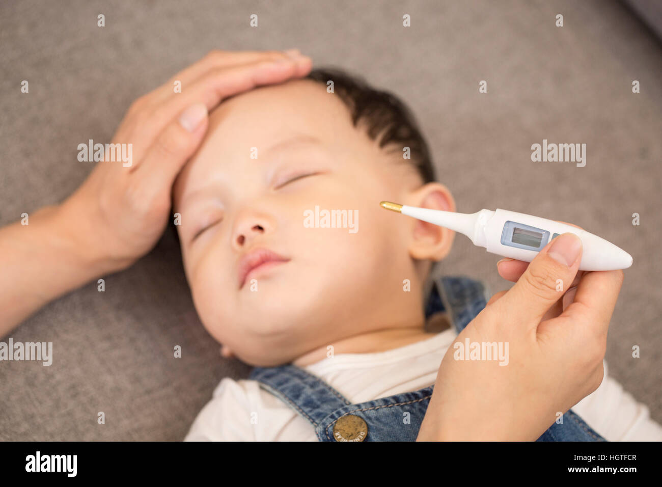 Young baby sick mother hi-res stock photography and images - Alamy