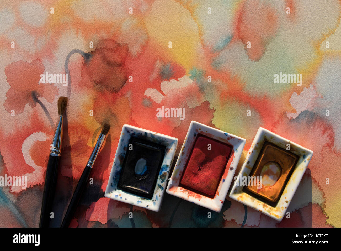 Color pans with brushes on poppies watercolor background Stock Photo ...