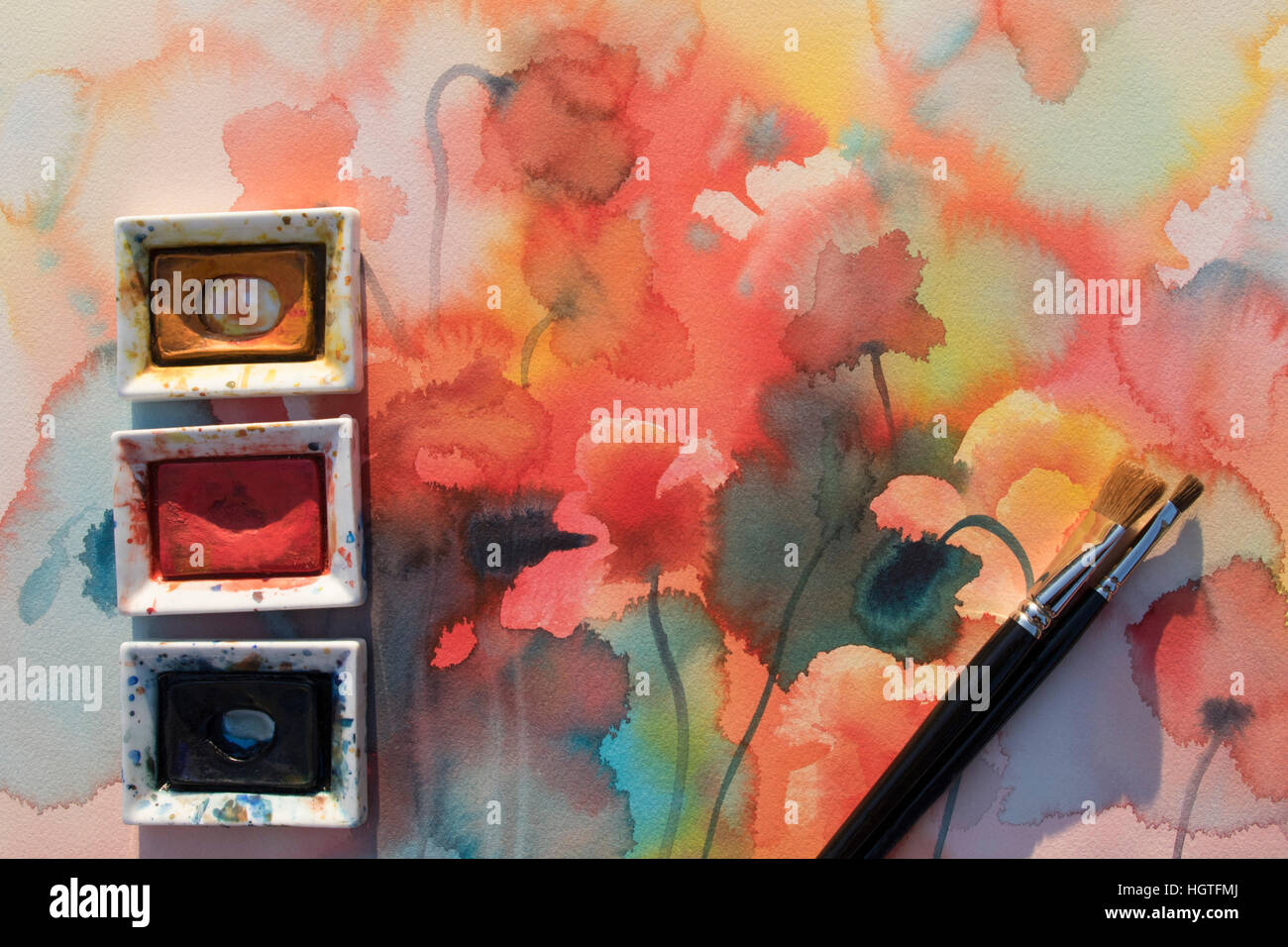 Color pans with brushes on poppies watercolor background Stock Photo ...