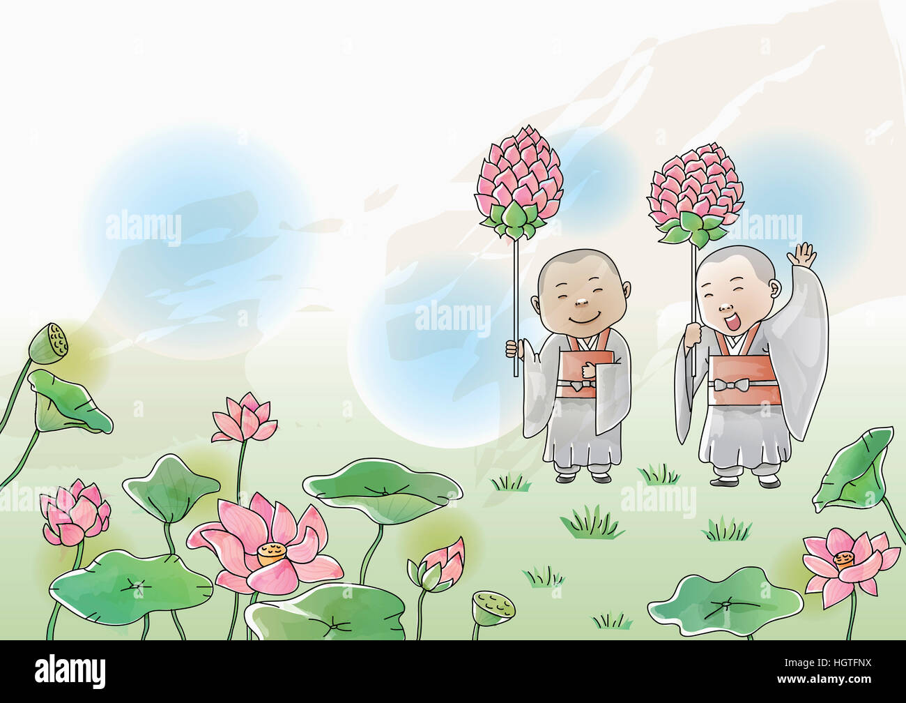 Two smiling young monks with lotus flowers Stock Photo - Alamy