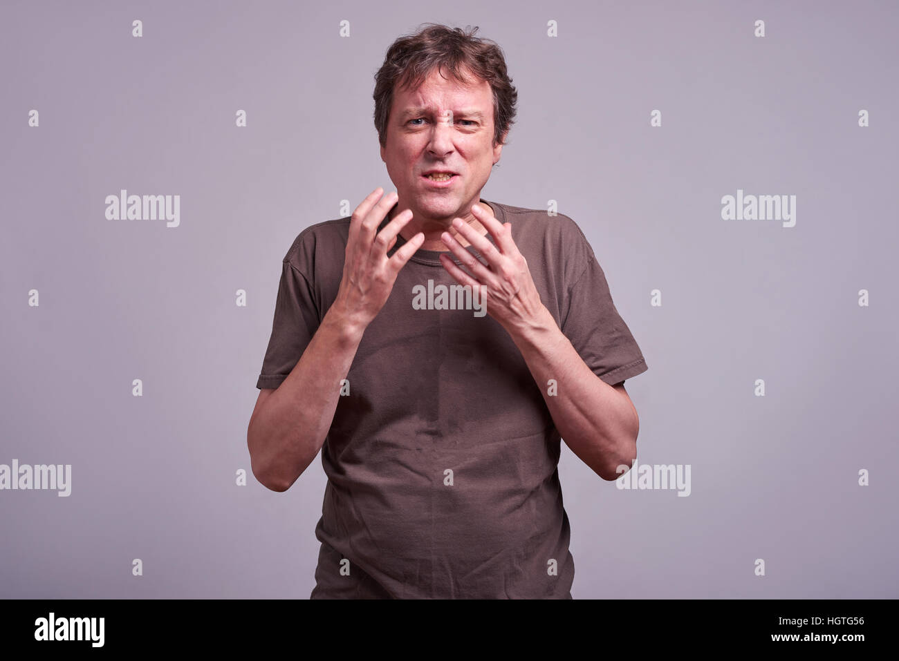 Scared aged man hi-res stock photography and images - Alamy