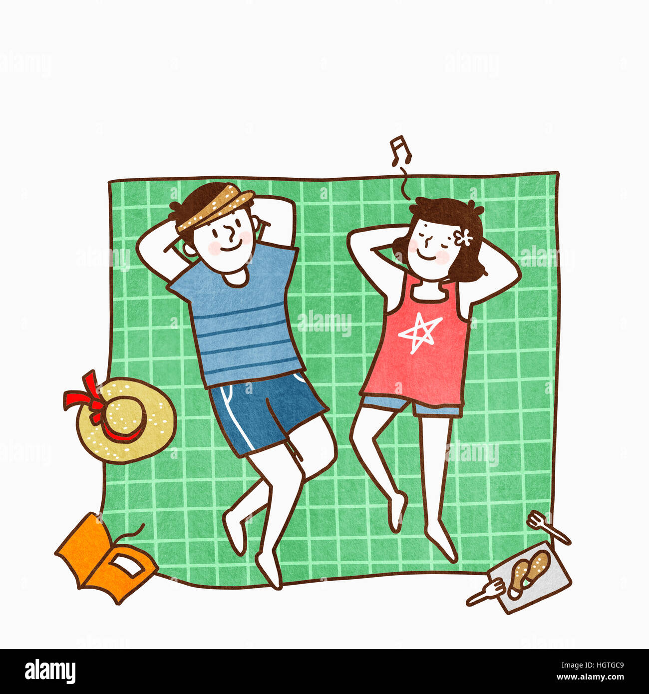 Couple taking a nap during picnic Stock Photo - Alamy