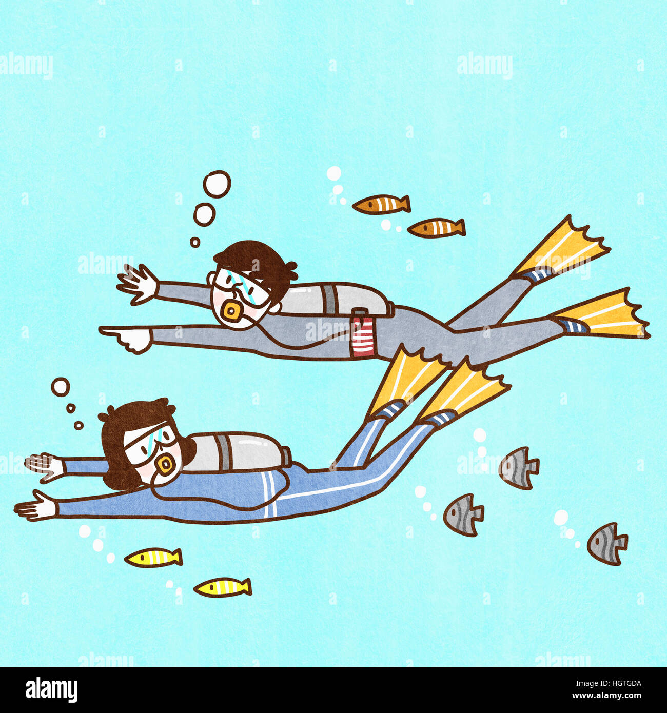 Couple enjoying scuba diving Stock Photo - Alamy