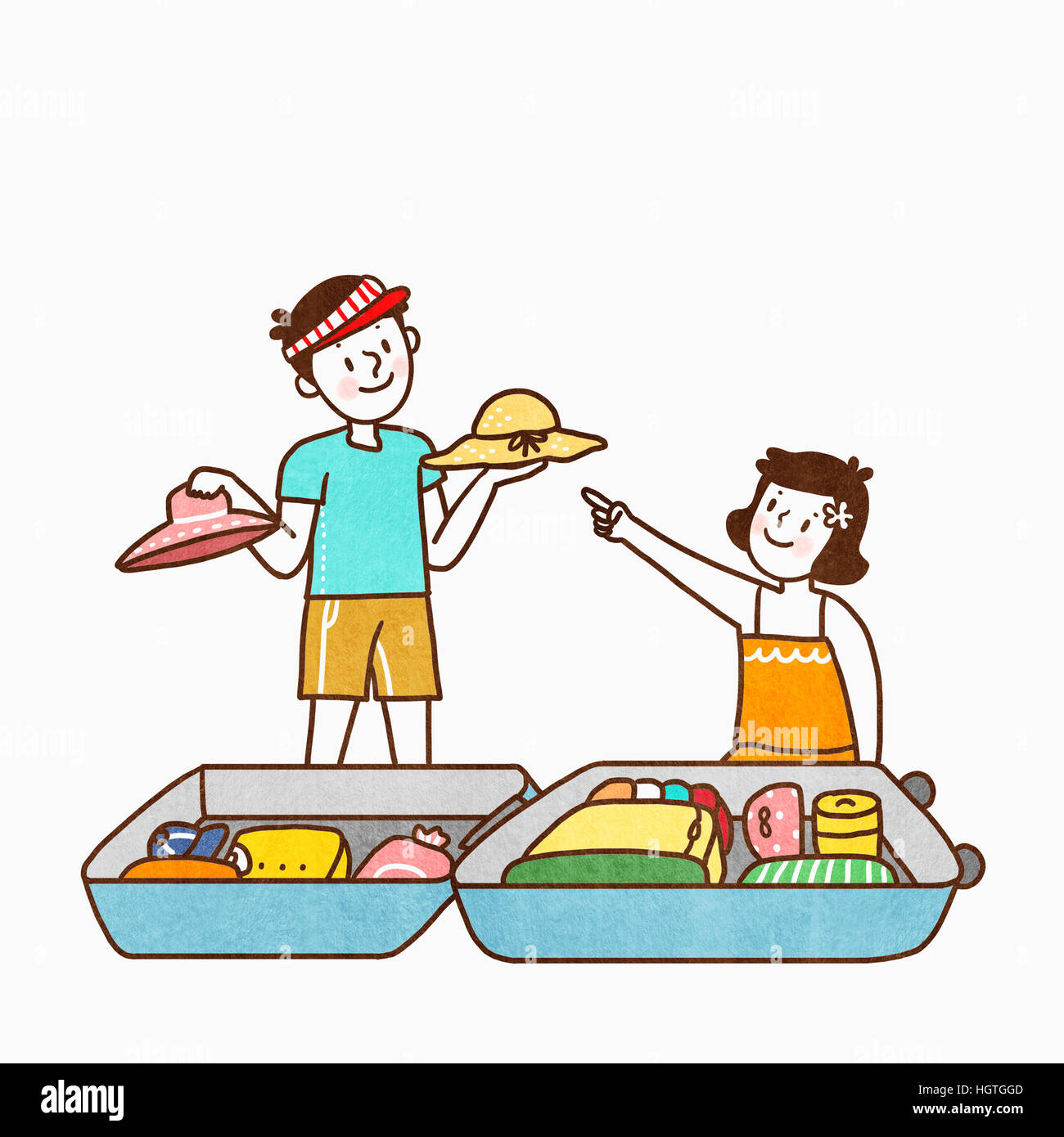 Romantic couple packing suitcase Stock Photo - Alamy