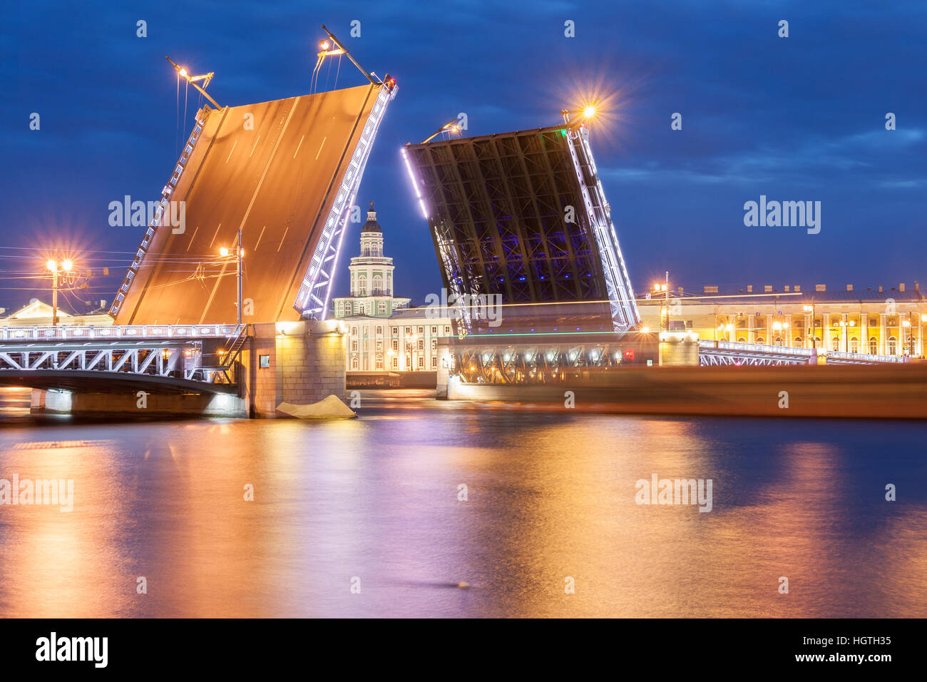 The raised Palace bridge at white nights in the city of St.-Petersburg ...