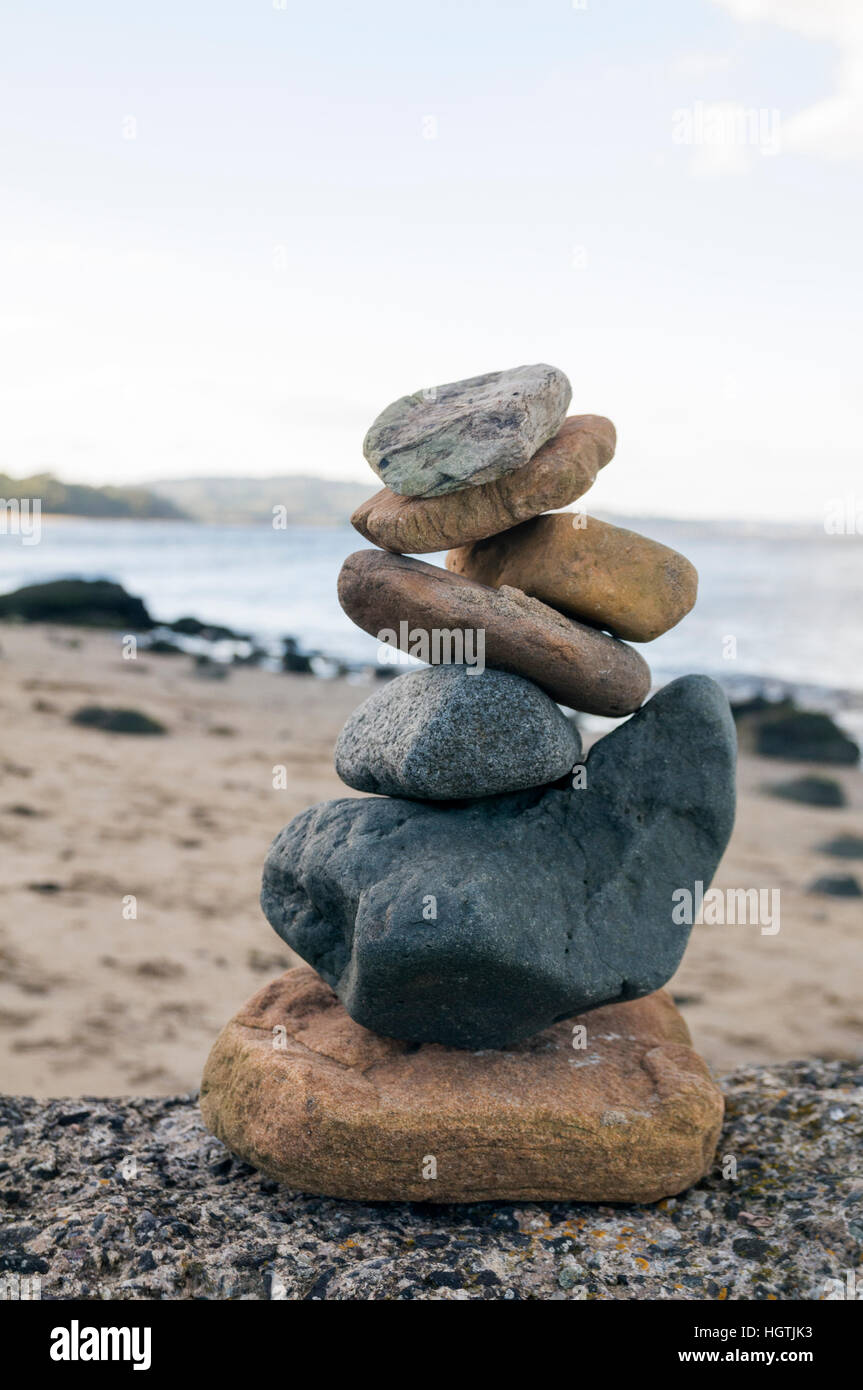 Pile of pebble stones on a beach Stock Photo - Alamy