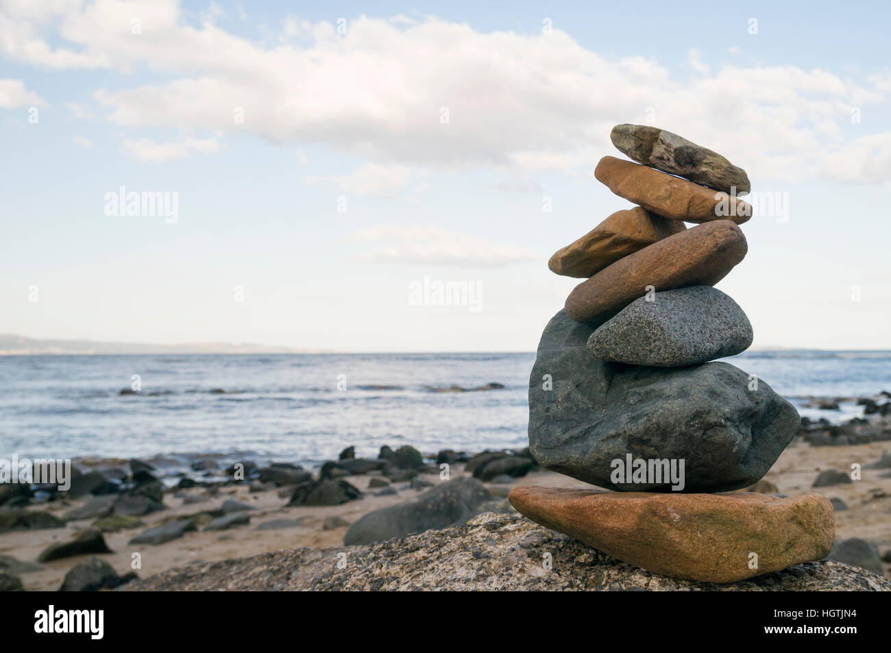 Pile of pebble stones on a beach Stock Photo - Alamy