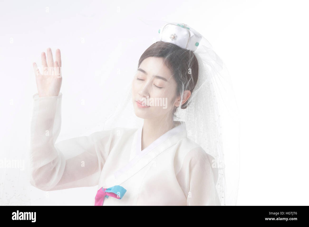 Side view portrait of young bride closing her eyes and wedding veil ...