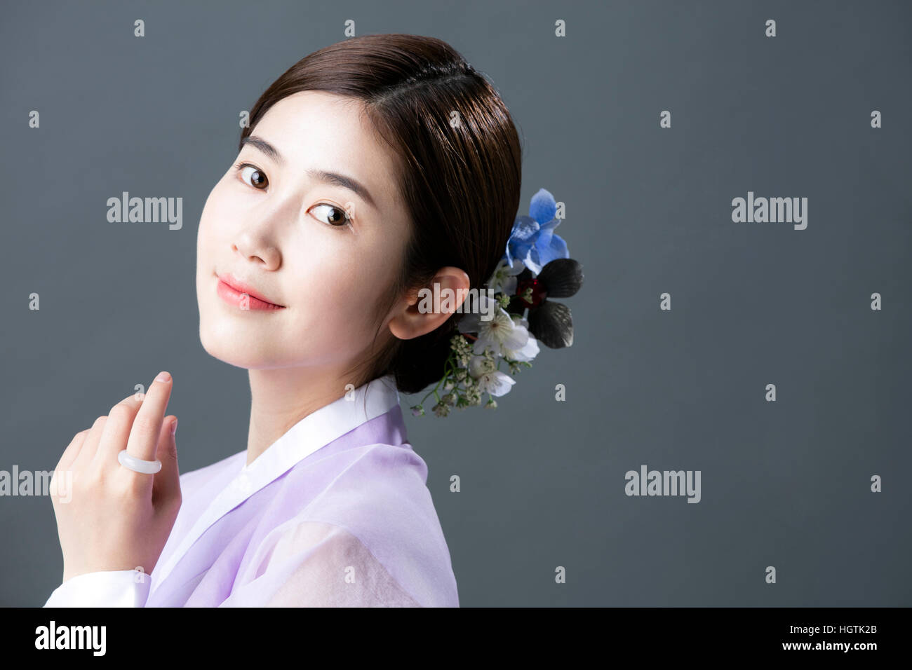 Side view portrait of young woman in traditional Korean clothes Stock ...