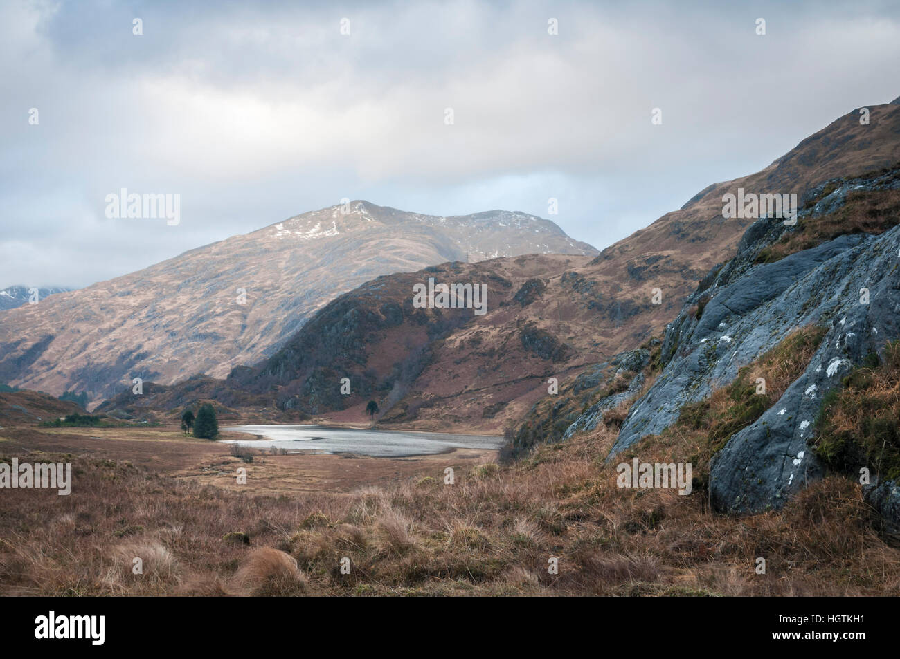 A winter image of Loch Coire Shubh and the Kinloch Hourn mountains in ...