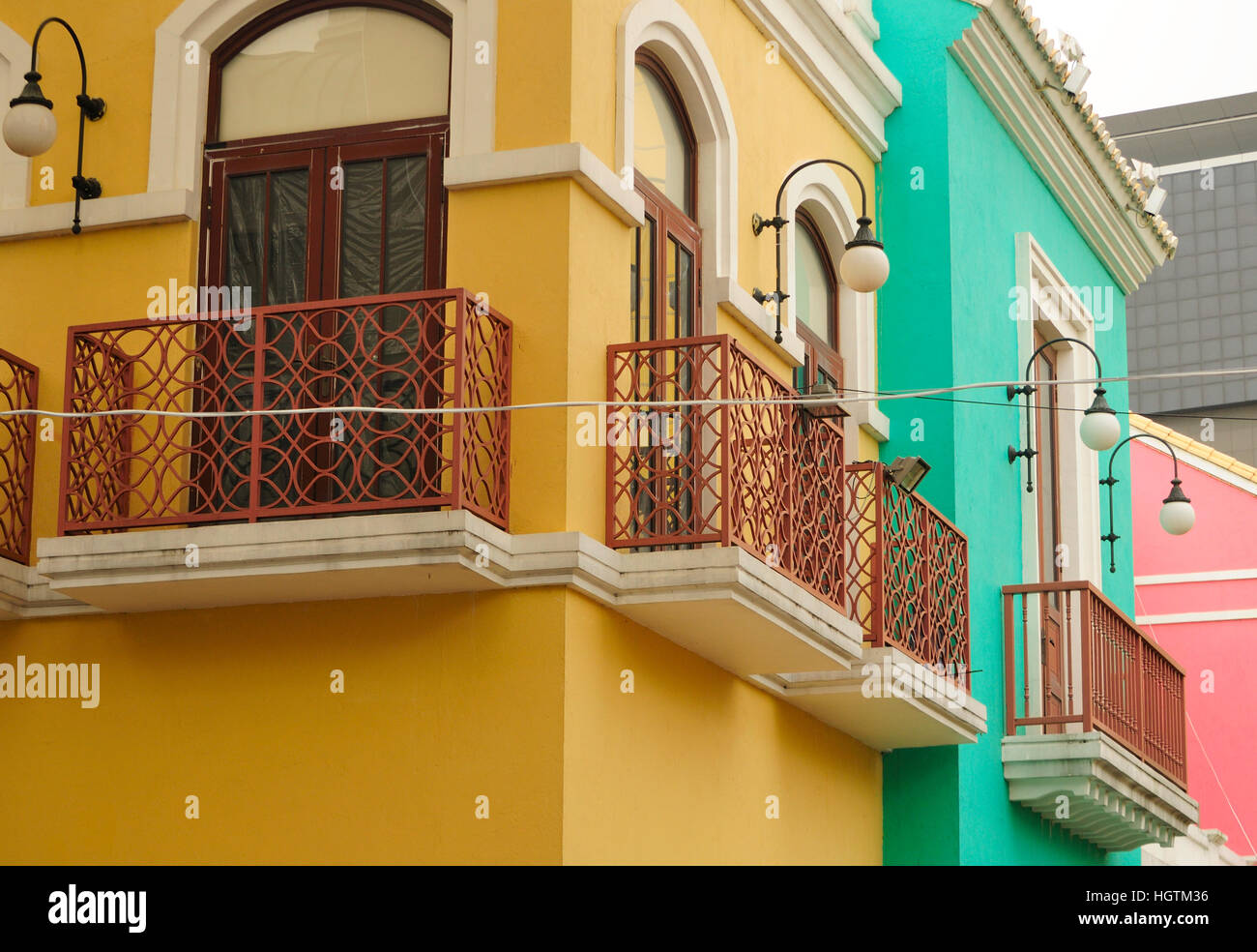 Pink, yellow and aqua colored exteriors of european architecturely ...