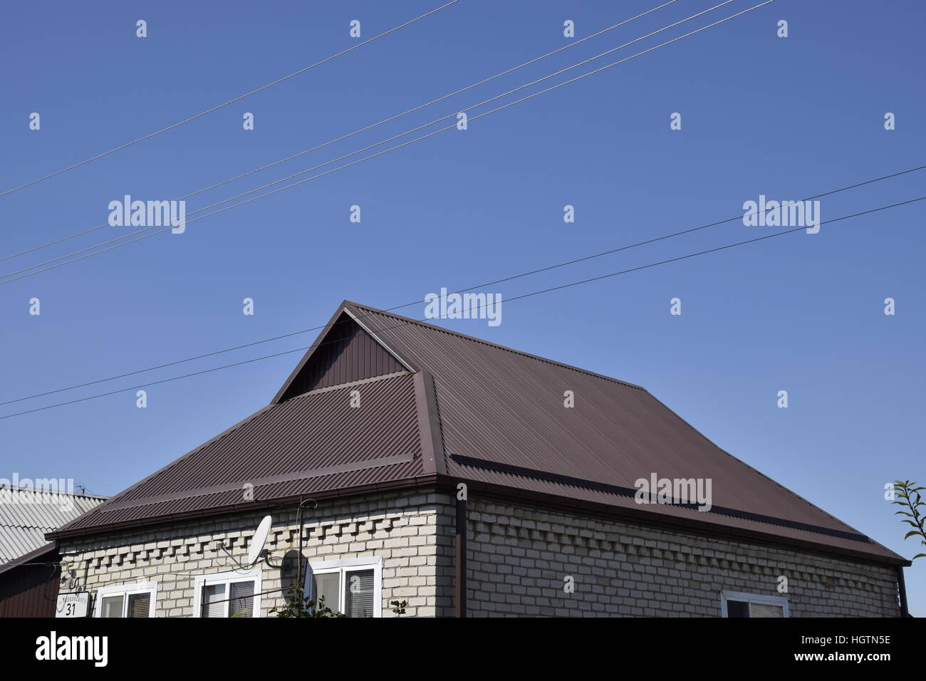 Detached house with a roof made of steel sheets. Roof metal sheets ...