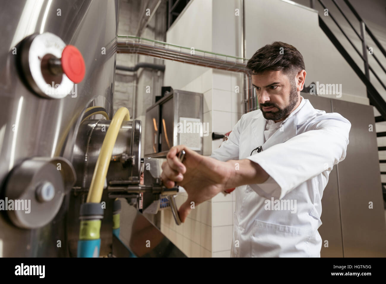 Man opening tap hi-res stock photography and images - Alamy