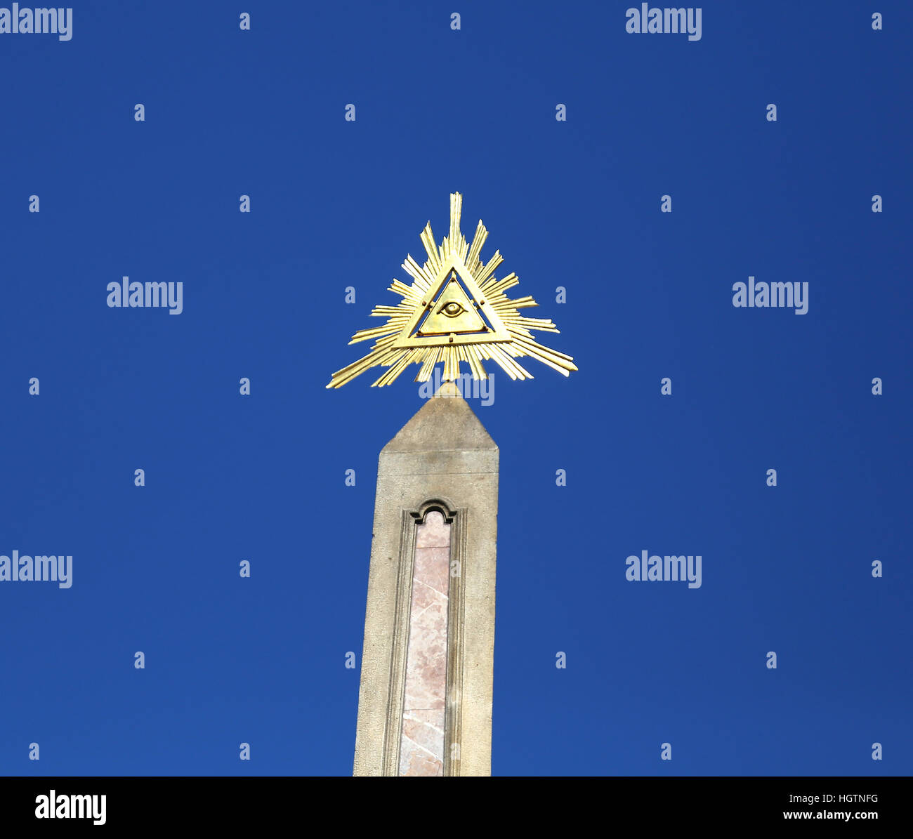 Obelisk and the symbol of the trinity with triangle and one big Eye of ...