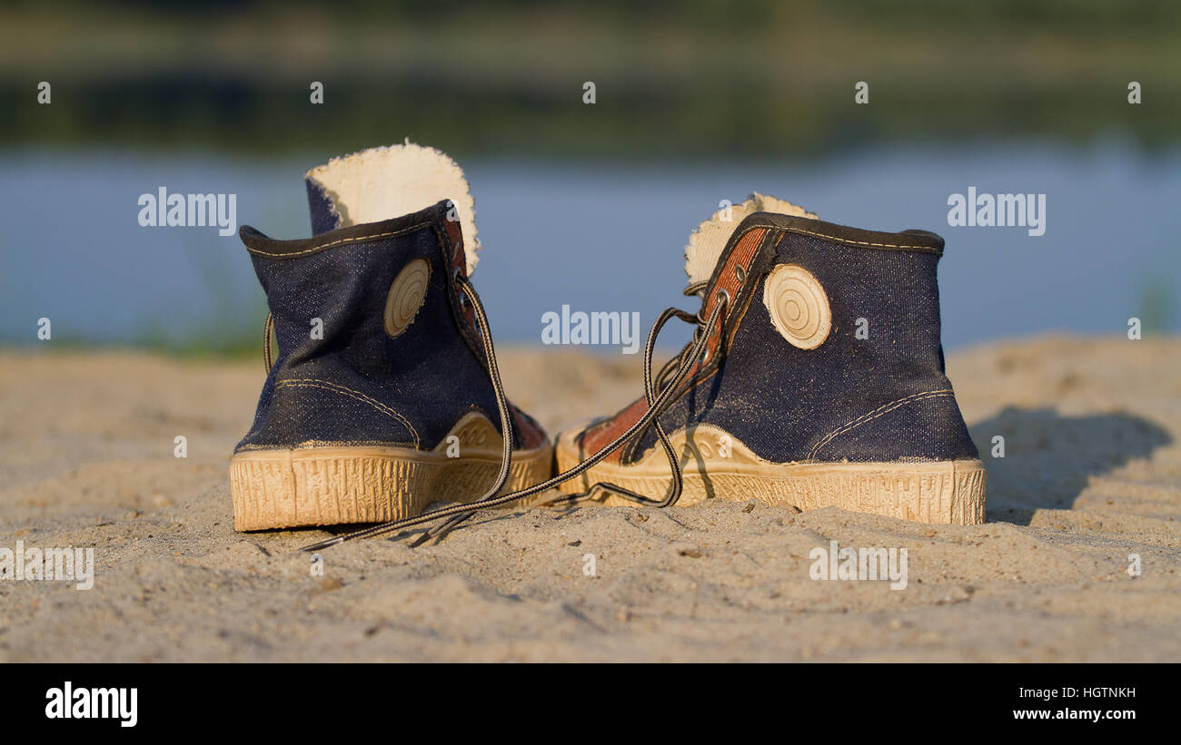 Shoes on the sand hi-res stock photography and images - Alamy