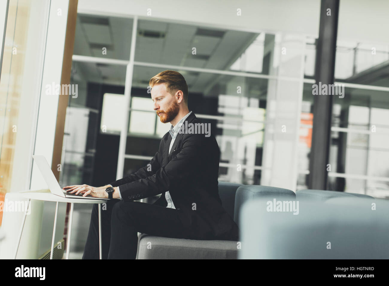 Working in office man red hi-res stock photography and images - Alamy