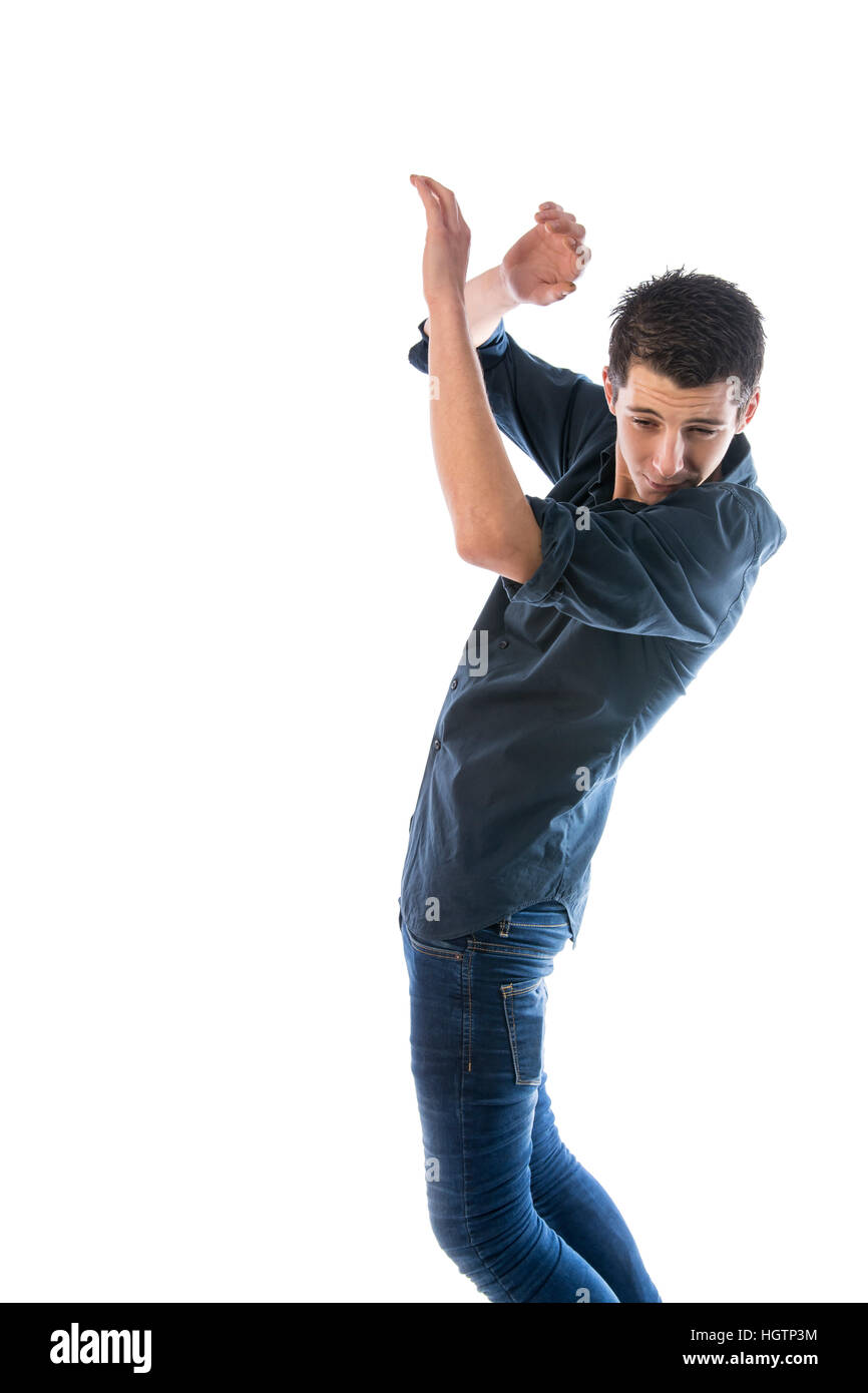 young man wearing blue shirt flinched his arms scared against white ...