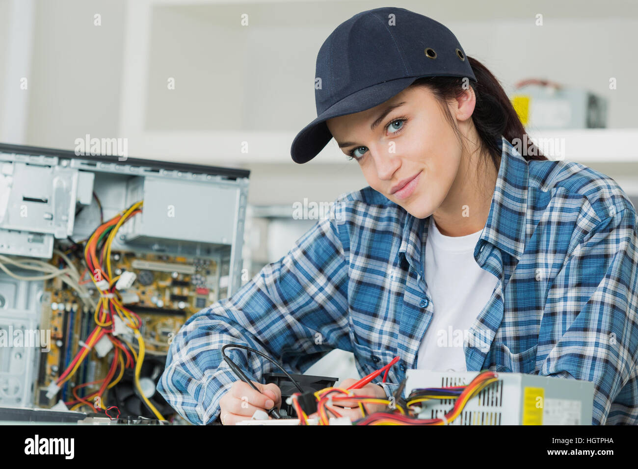woman fixing a CPU Stock Photo - Alamy