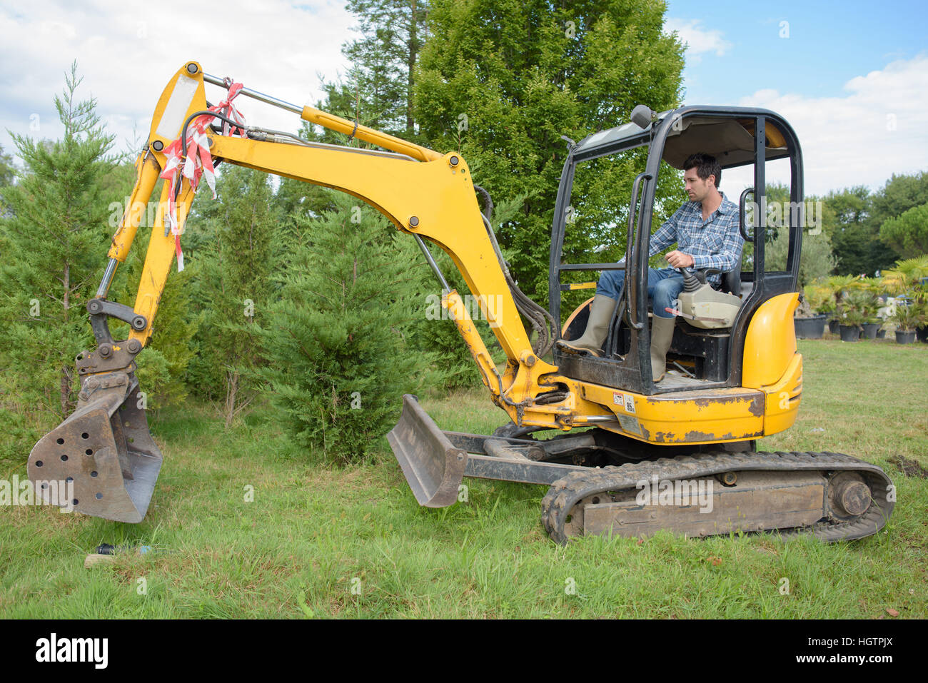 operating a backhoe Stock Photo - Alamy
