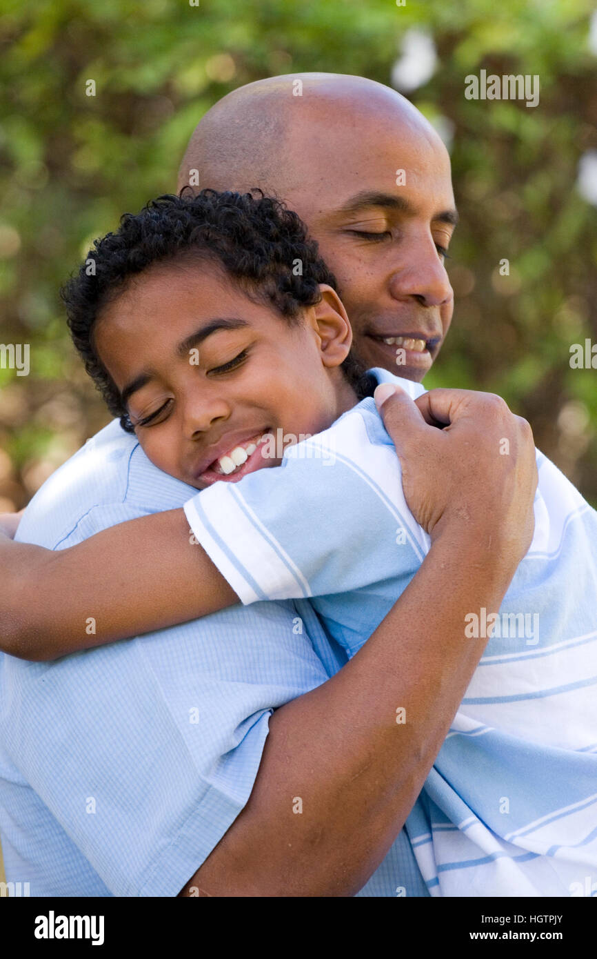 African American father and son spending time together Stock Photo - Alamy