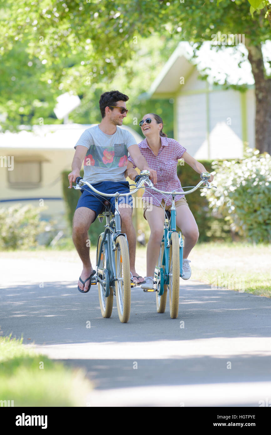 Couple on bicycles Stock Photo - Alamy