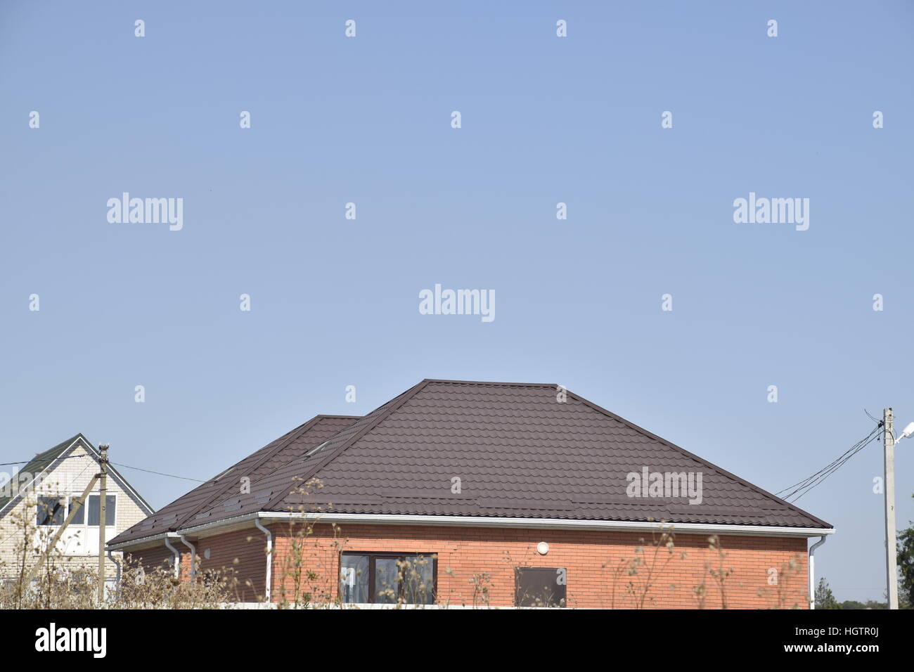 Detached house with a roof made of steel sheets. Roof metal sheets ...